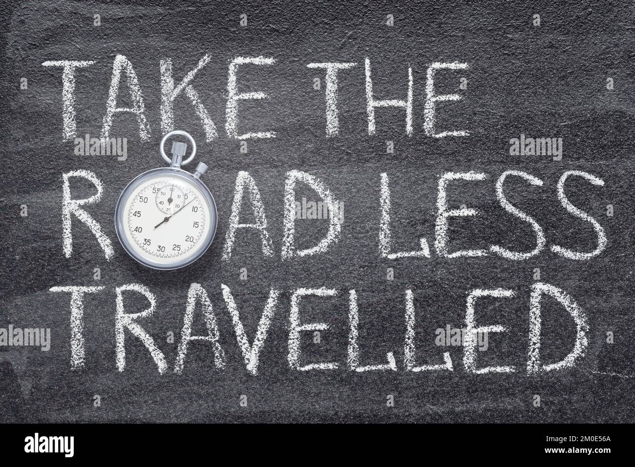 take the road less travelled phrase written on chalkboard with vintage ...