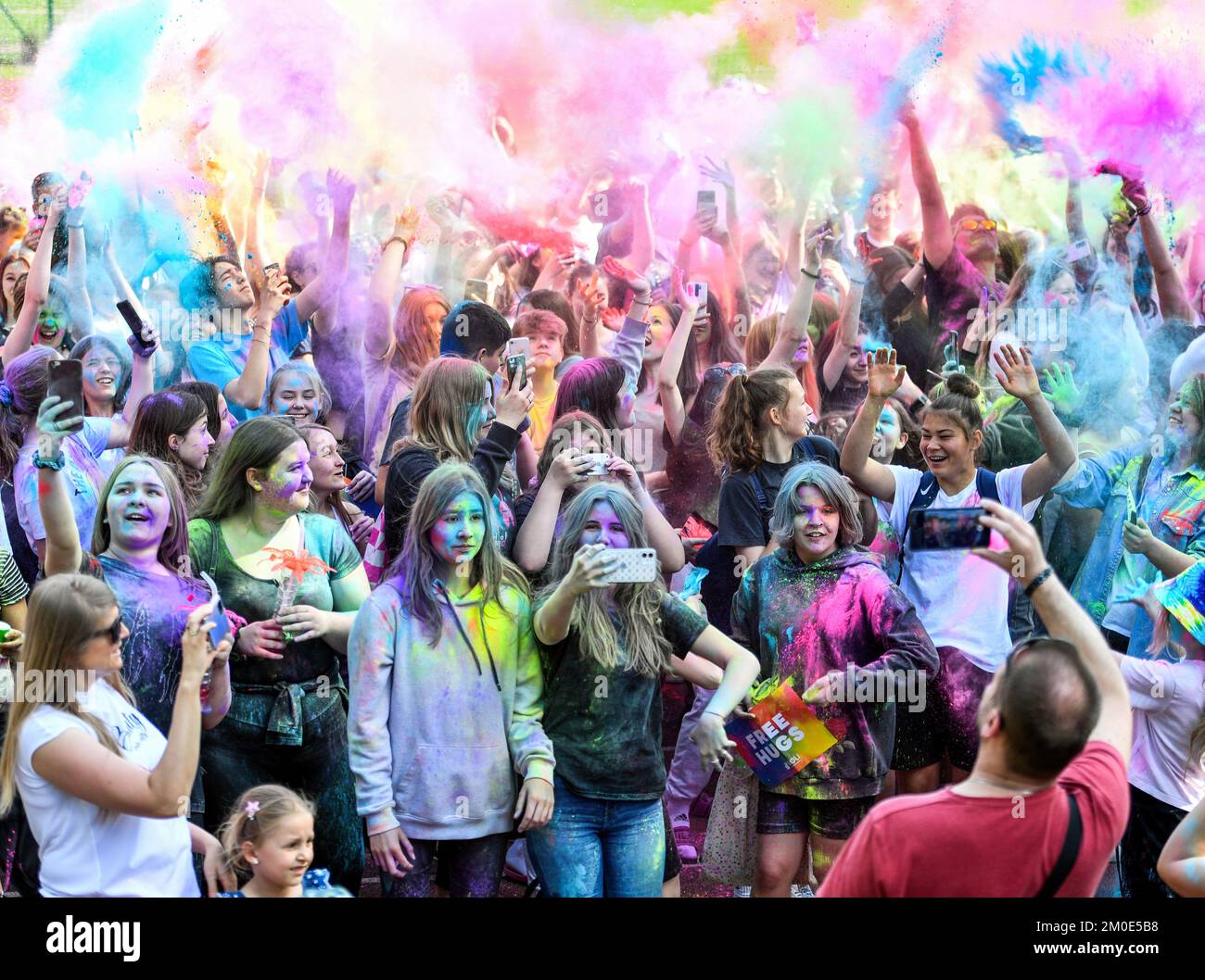 People seen throwing colorful powders at each other during the Holi ...