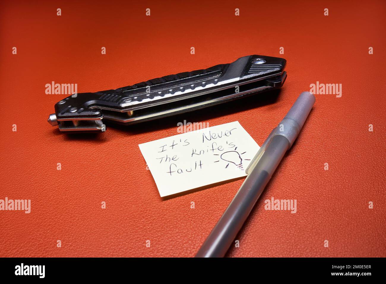 it's never the knifes fault sticky note and pen. think about it it's ...