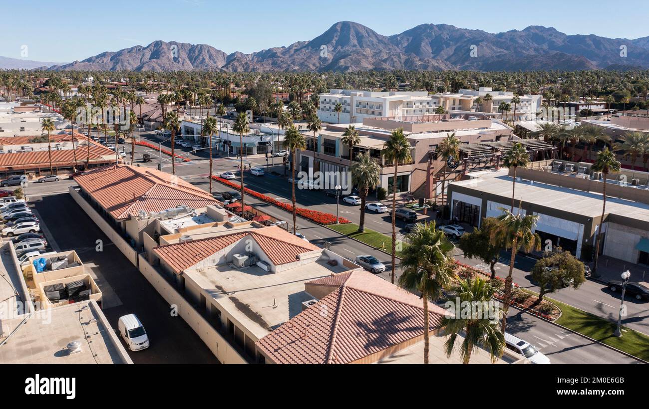 Daytime aerial view of the urban downtown area and mountains of Palm ...