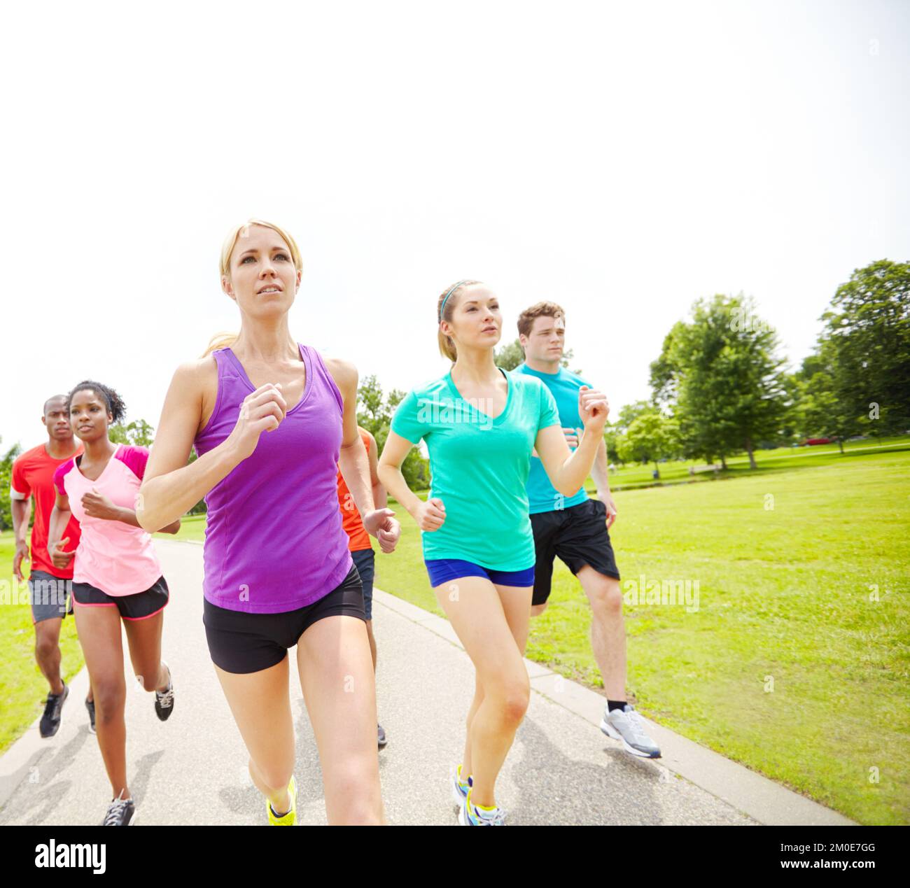 Supporting my healthy lifestyle. Front view of a group of male and ...