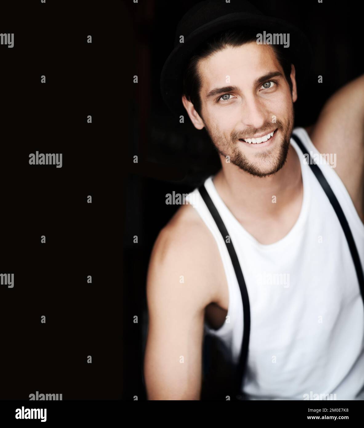 His smile is his greatest asset. Portrait of a handsome young man ...