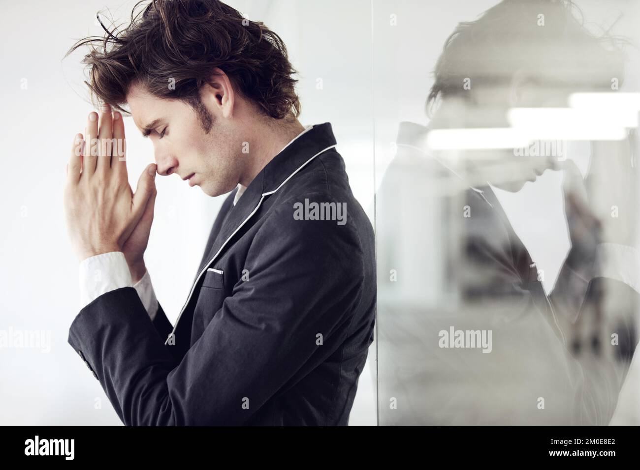 Side profile man praying hi-res stock photography and images - Alamy