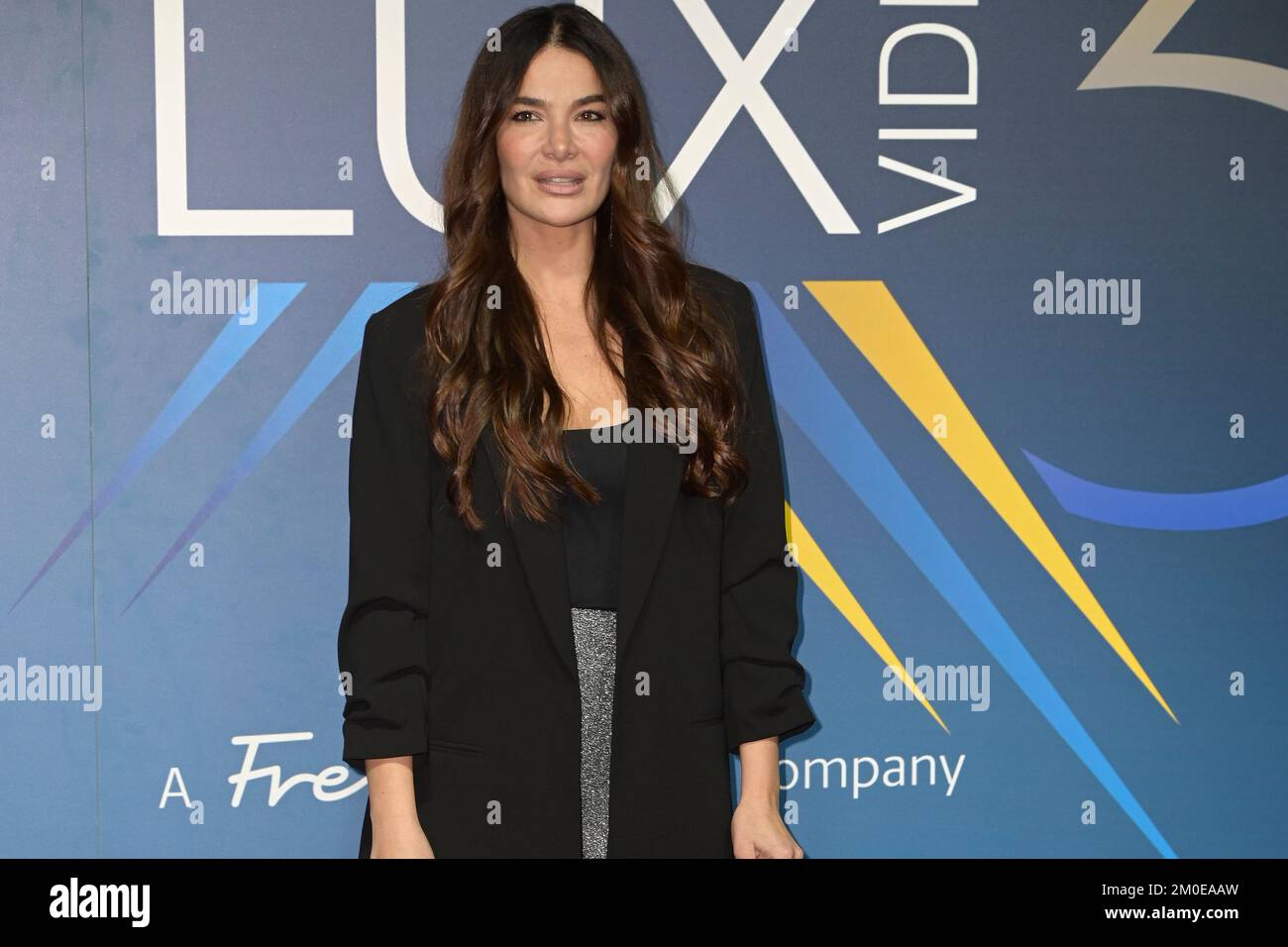 Ilaria Spada attends the blue carpet for the Lux Vide 30th anniversary ...