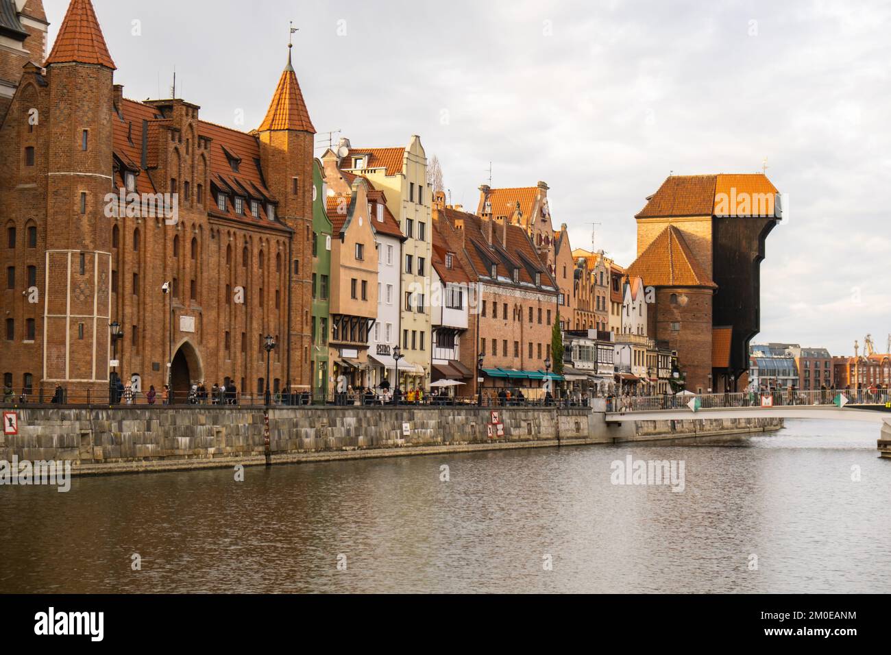 Ancient crane - zuraw Old town in Gdansk. The riverside on Granary ...