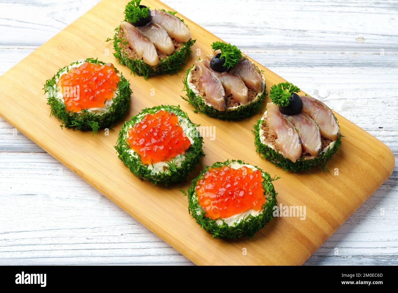 Catering banquet table food snacks with fish Stock Photo - Alamy