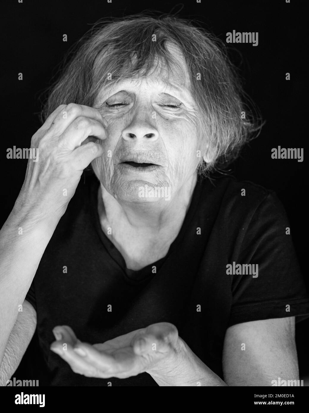 Mature woman crying Black and White Stock Photos & Images - Alamy