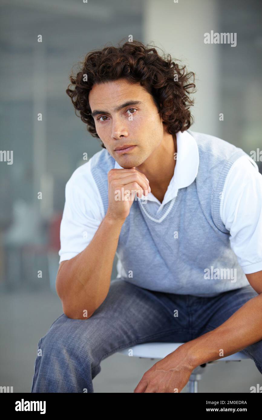 He takes business seriously. A serious entrepreneur looking thoughtful ...