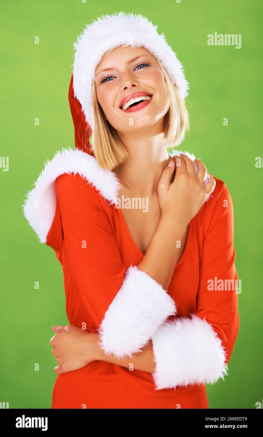 Love is all around at Christmas. A beautiful young woman in a Christmas ...