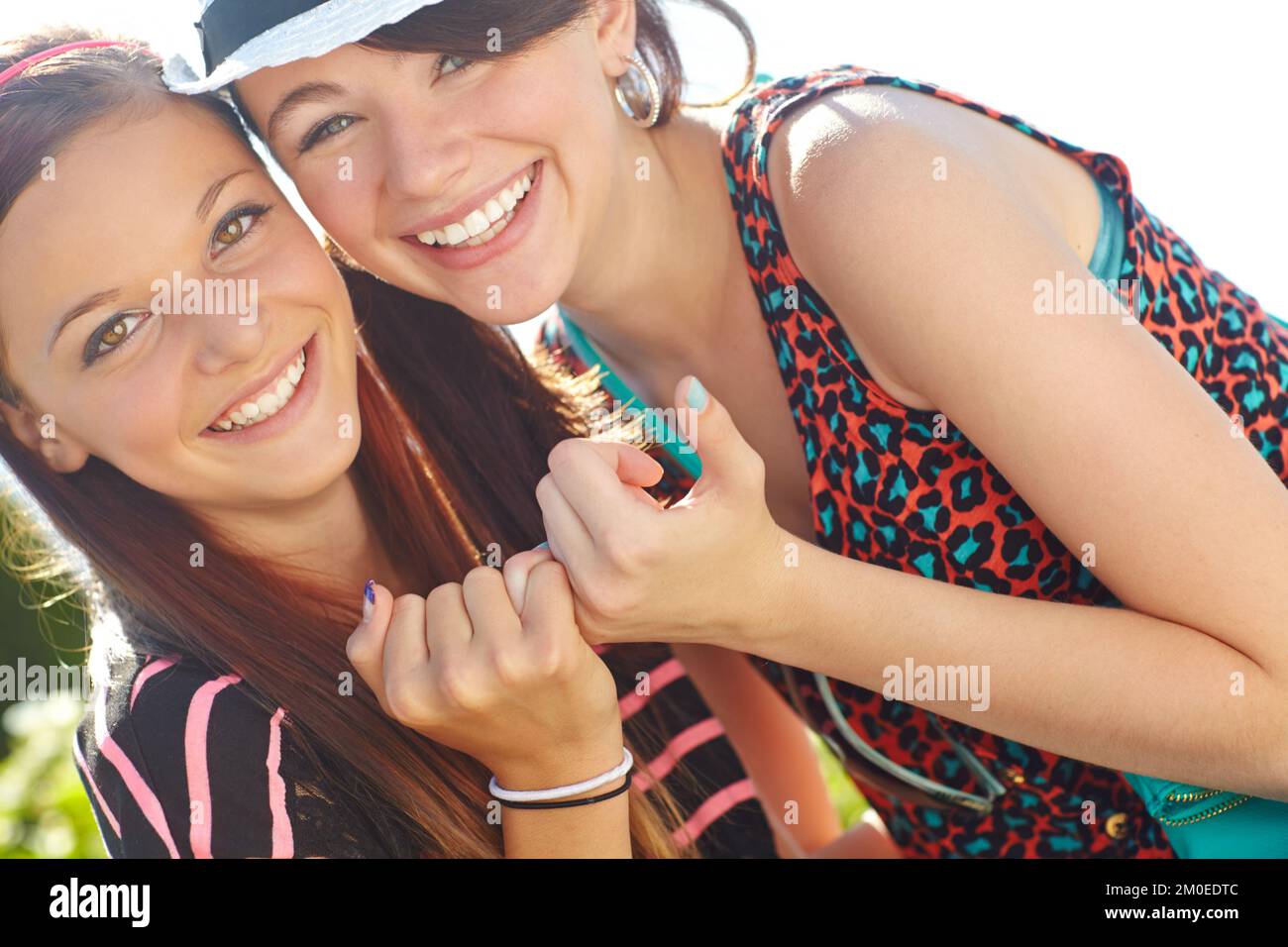 Our bond cannot be broken. Two adolescent girls doing a pinky swear ...