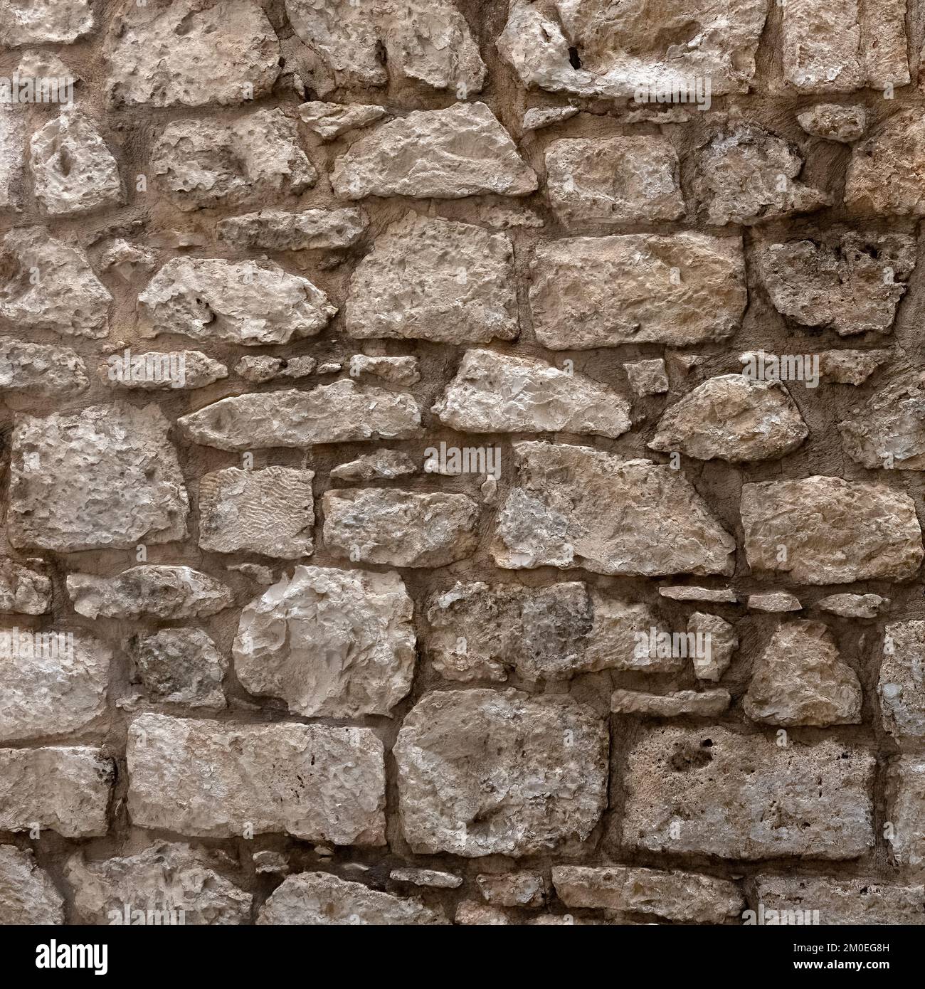 BACKGROUND TEXTURE - Cream coloured stone wall and cement pointing ...