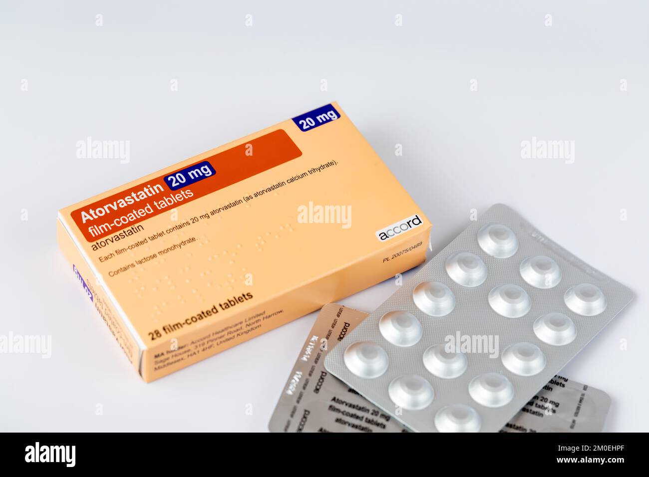 Photograph of a box and blister pack of 20 mg Atorvastatin statin ...