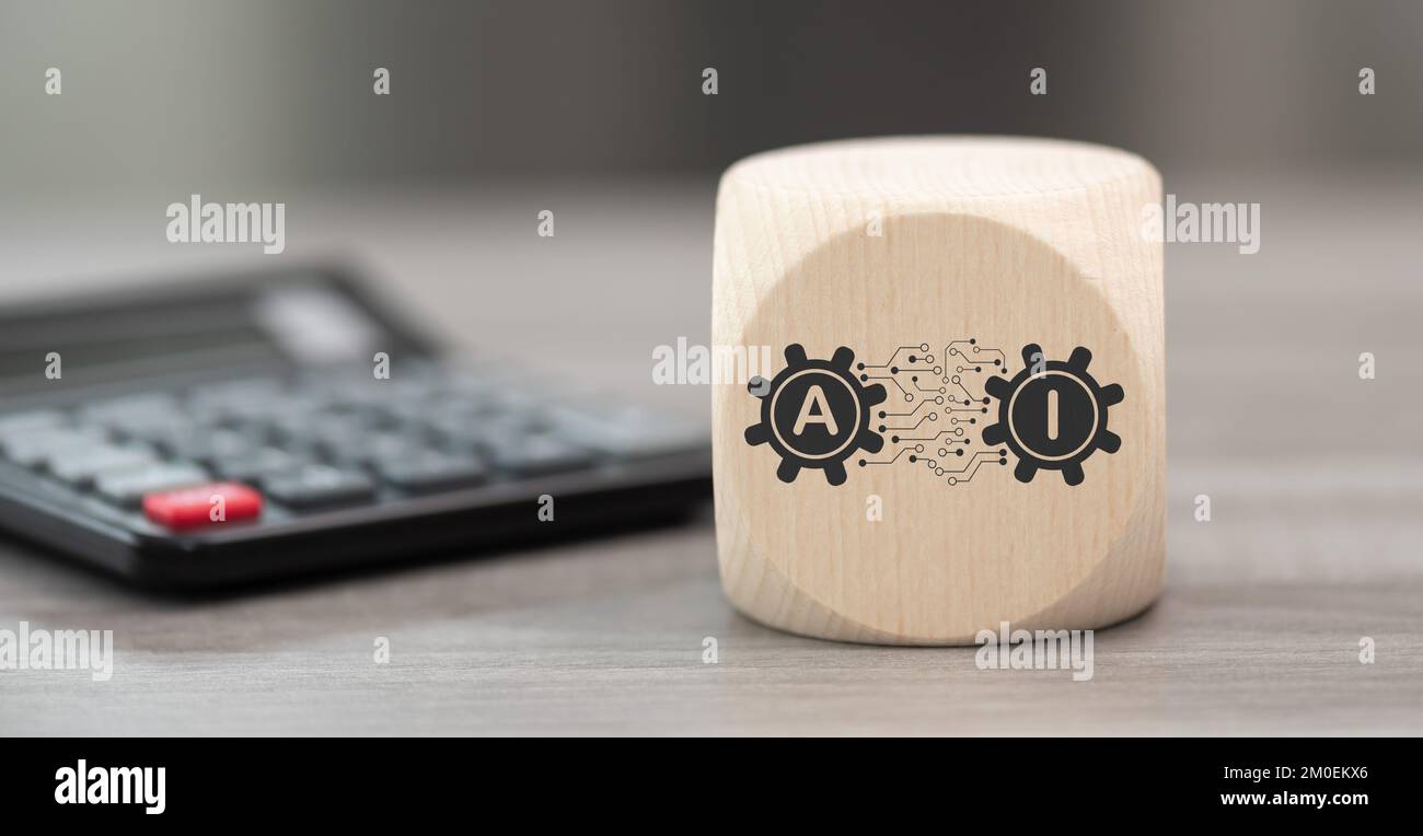 Wooden block with symbol of ai concept and calculator on background ...