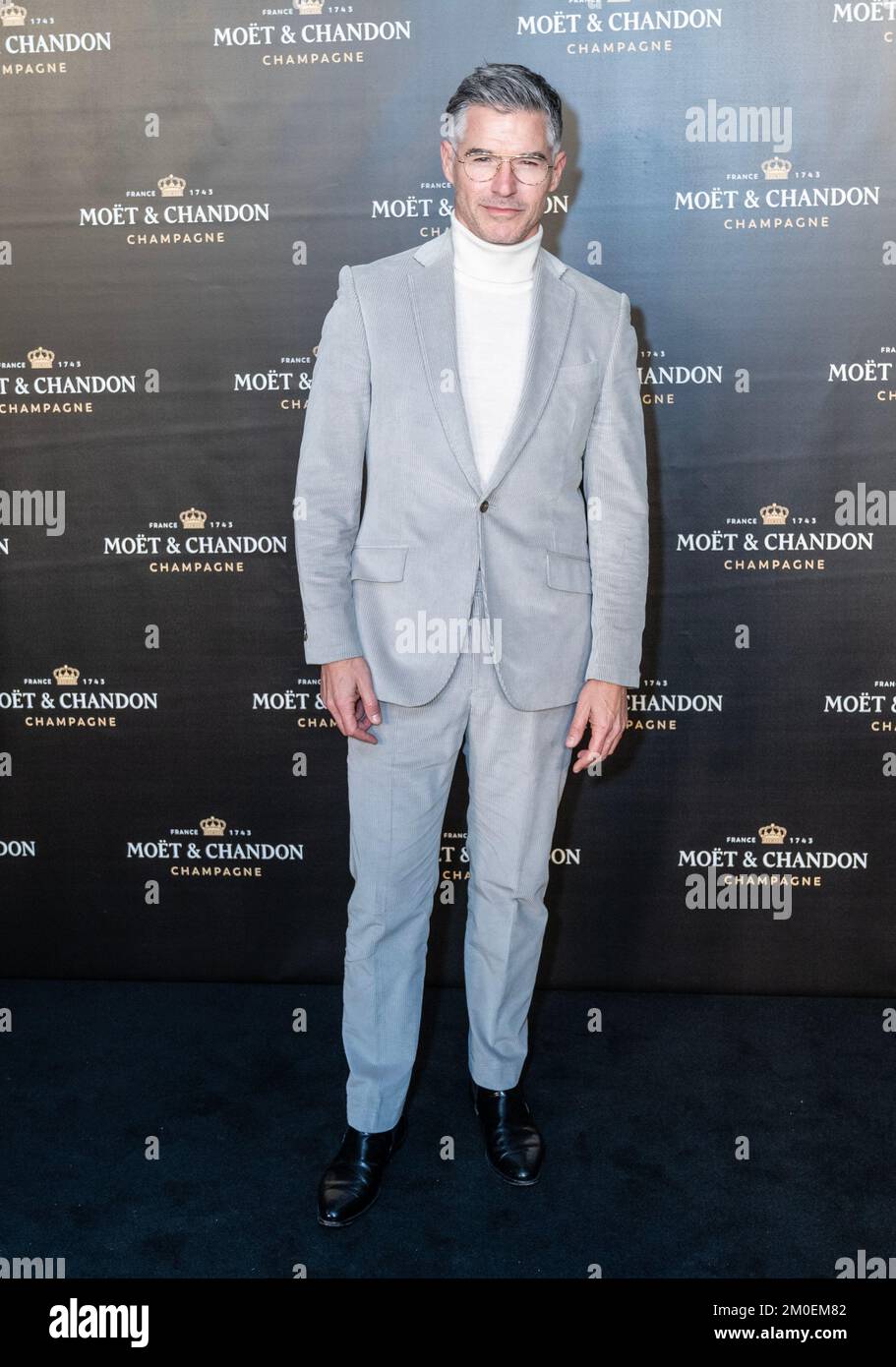 Eric Rutherford attends the Moet and Chandon Holiday Season Celebration ...