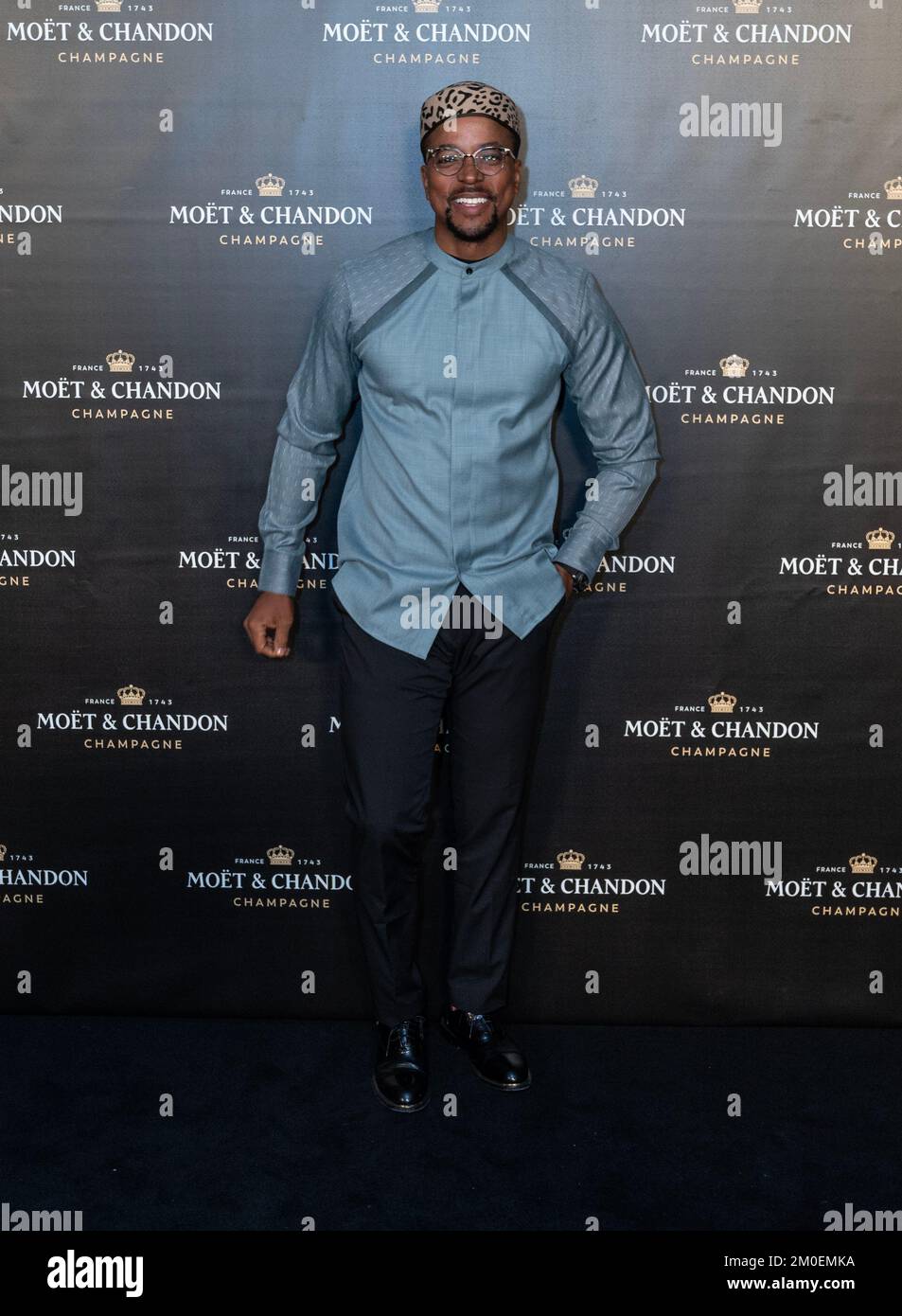 Maps Maponyane attends the Moet and Chandon Holiday Season Celebration ...