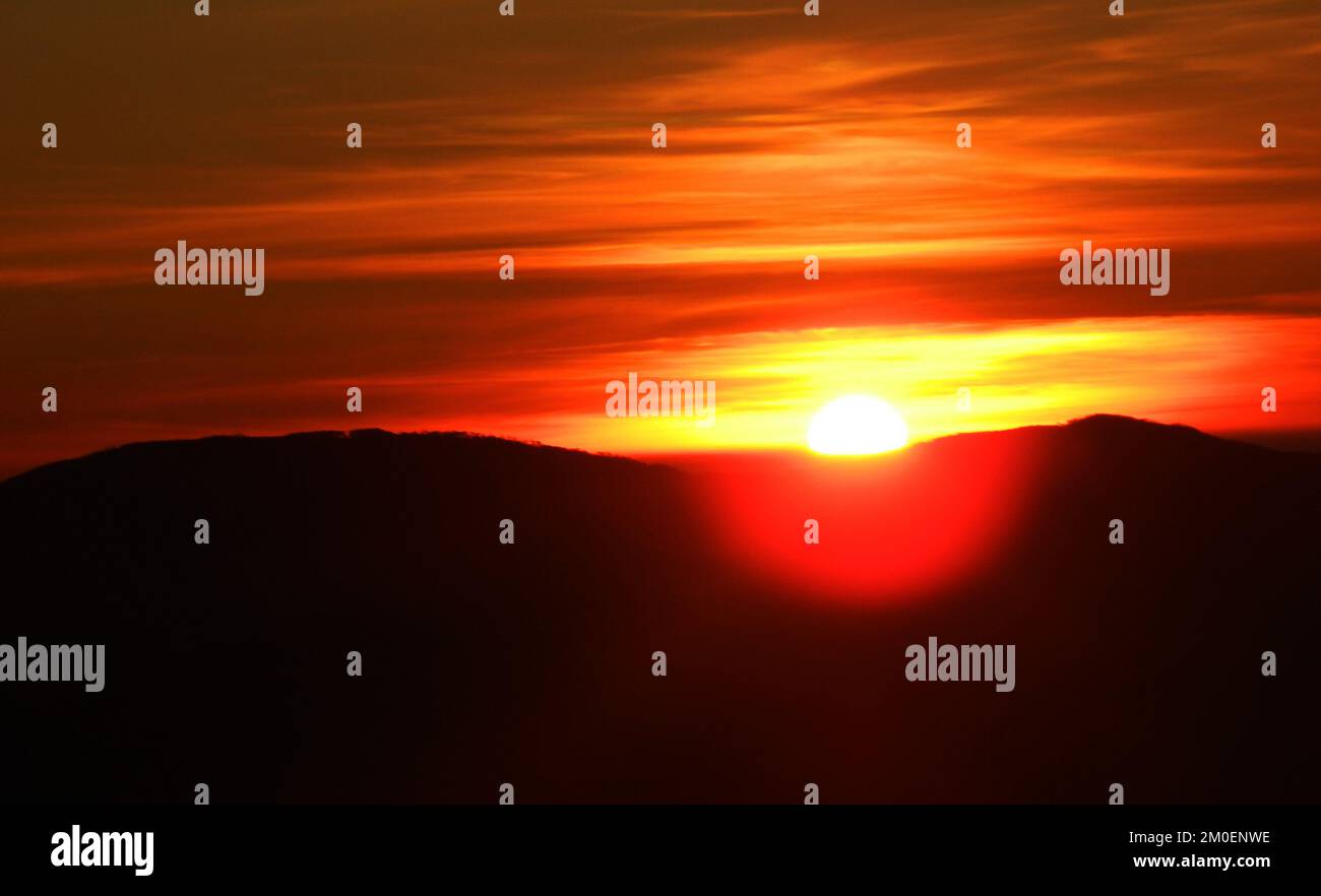 Sun rise/ Ira sevaya is a beautiful scenery from the Sri Pada mountain ...