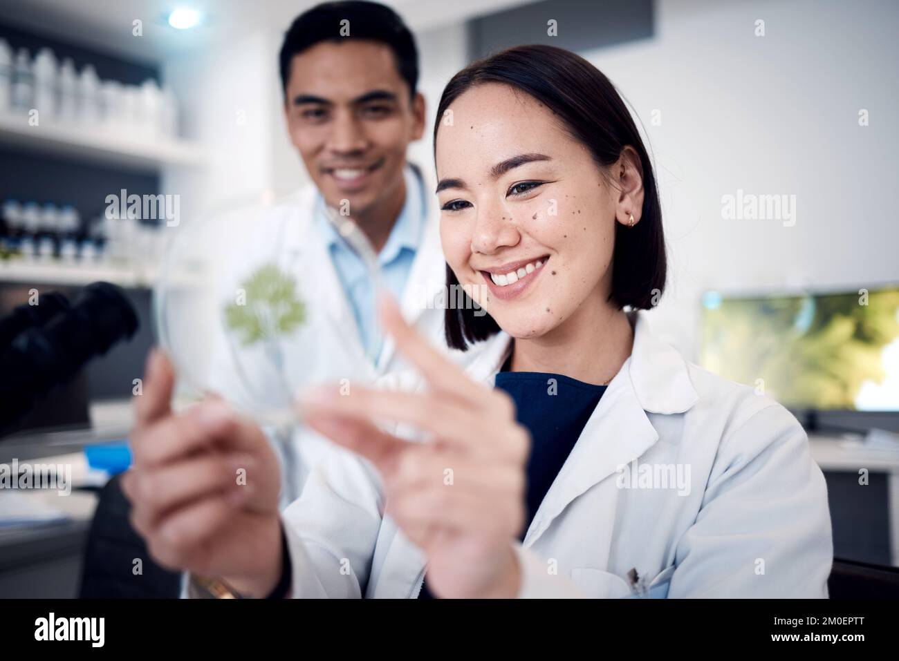 Scientist team, smile and green plant for food science study with ...