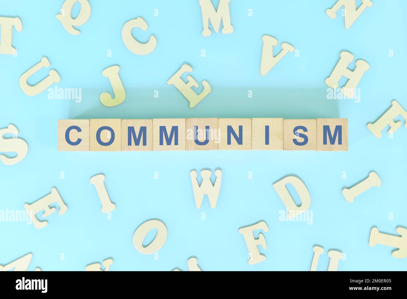 Communism government form concept. Wooden blocks typography flat lay in ...