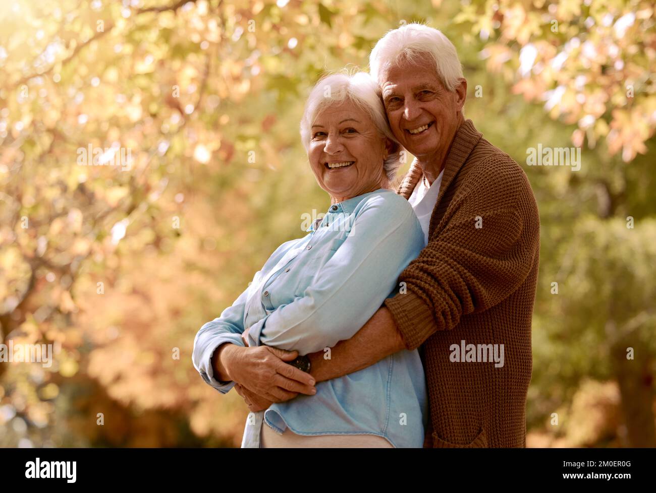 Elderly woman hands hugging tree hi-res stock photography and images ...