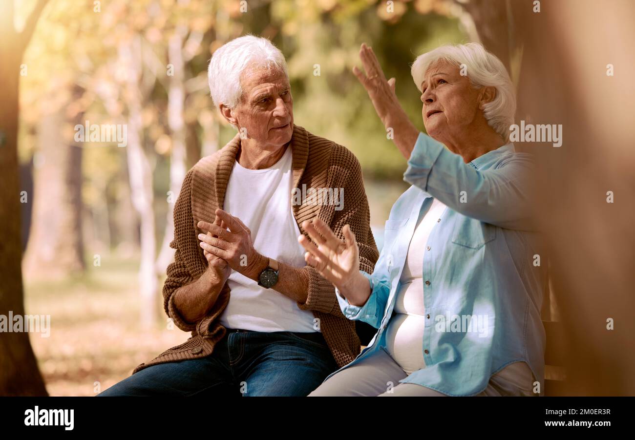 Senior couple, nature park and conversation for support, communication ...