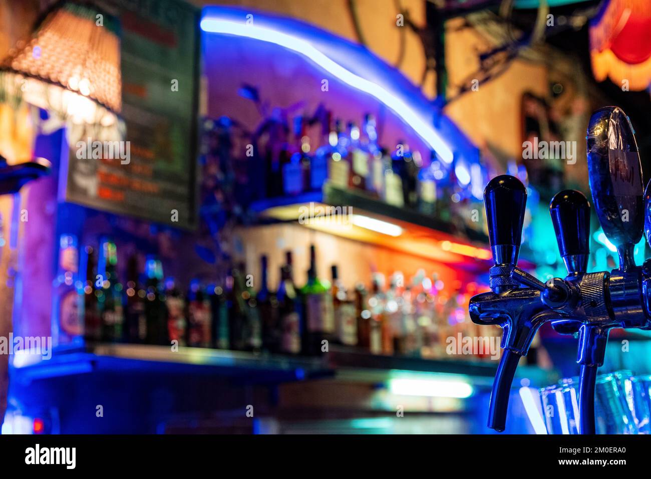 A closeup shot of beer taps against the isolated background of bar ...
