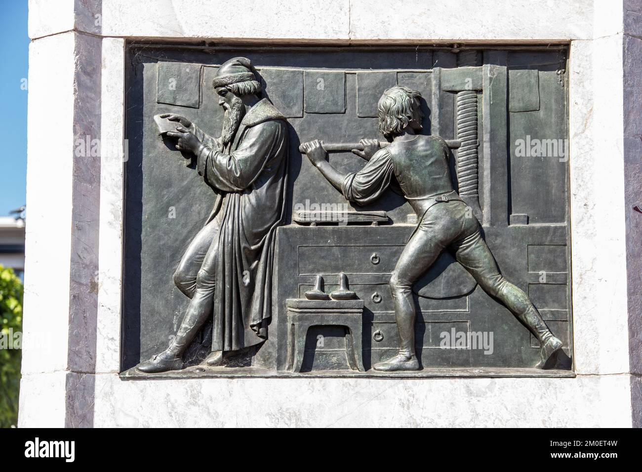 Depiction of creation of the Gutenberg bible on Statue of Johannes ...