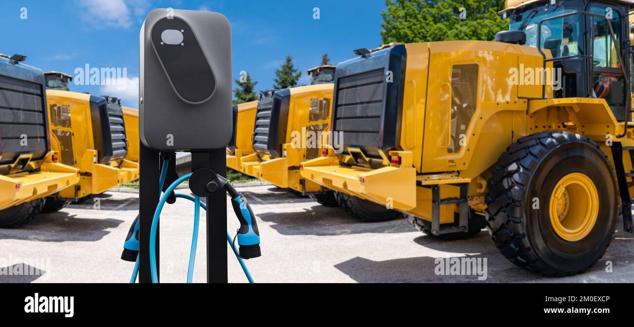 Electric construction machines with charging station. Concept Stock ...