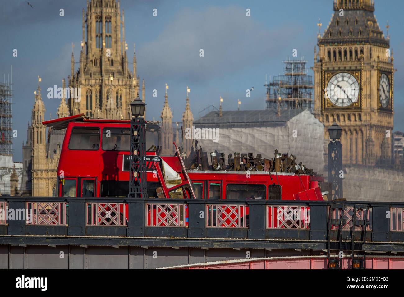 A London bus explodes on Lambeth Bridge in London during filming for a ...