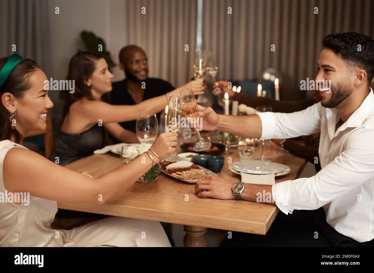 Party, cheers and friends with champagne for a celebration at a new ...