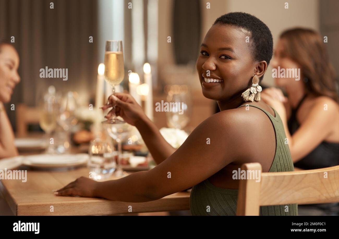 Friends, champagne and portrait girl at dinner celebration party to ...