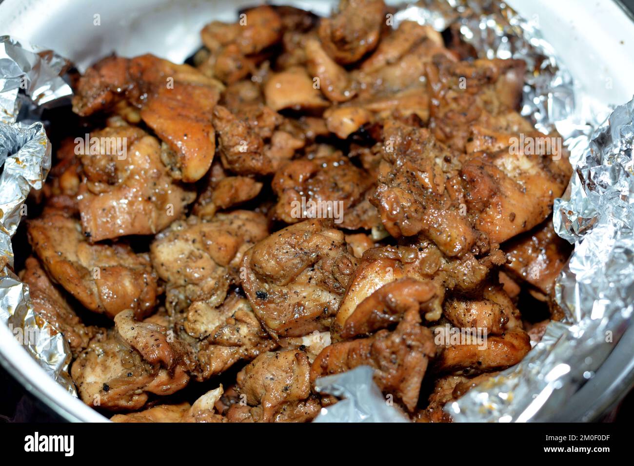 Shish taouk or shish tawook, a traditional marinated grilled chicken ...