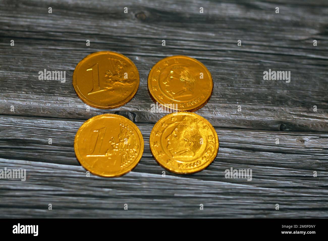 Chocolate euro coin depicts king Albert II and a monogram a capital A ...