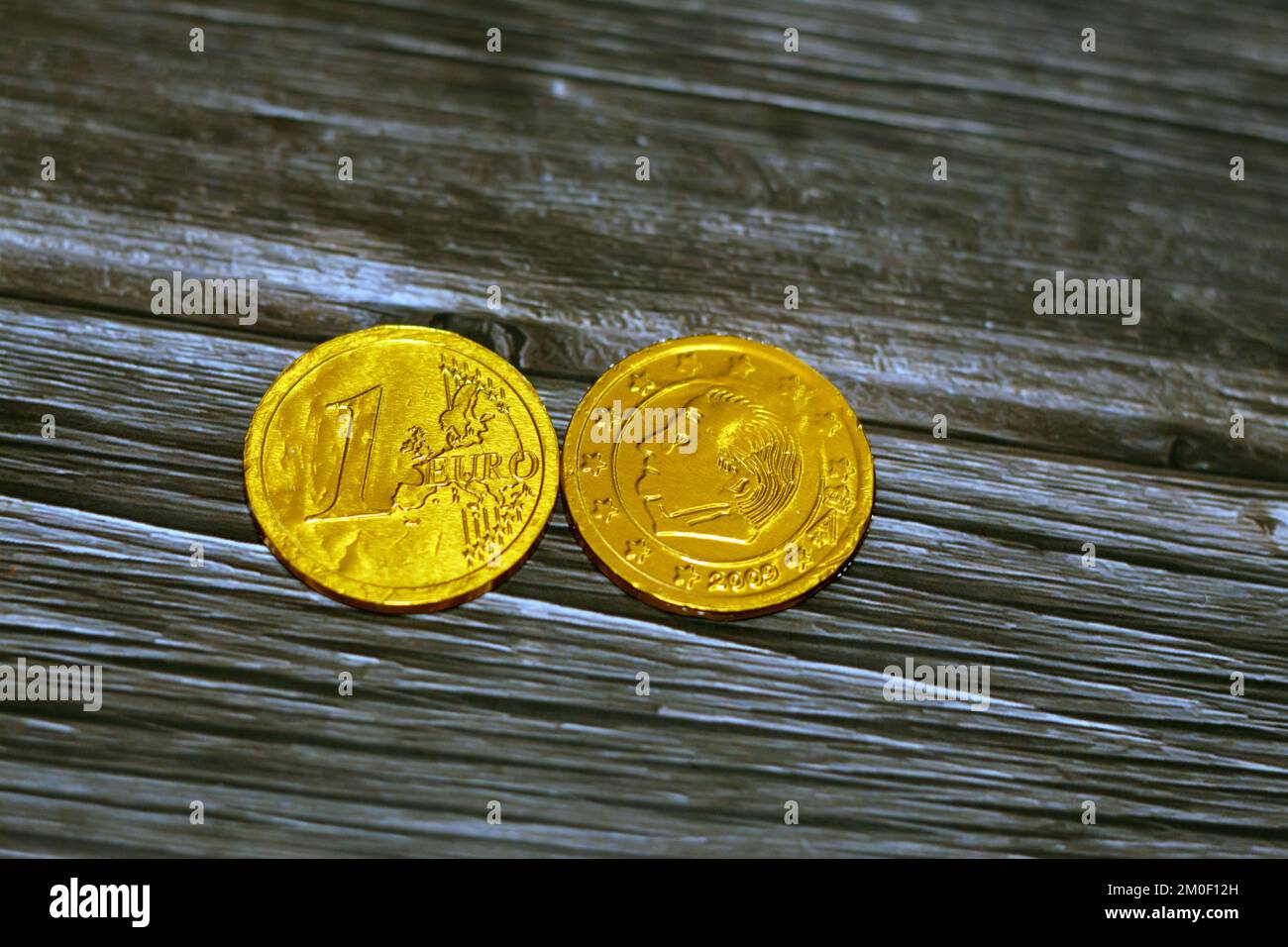 Chocolate euro coin depicts king Albert II and a monogram a capital A ...