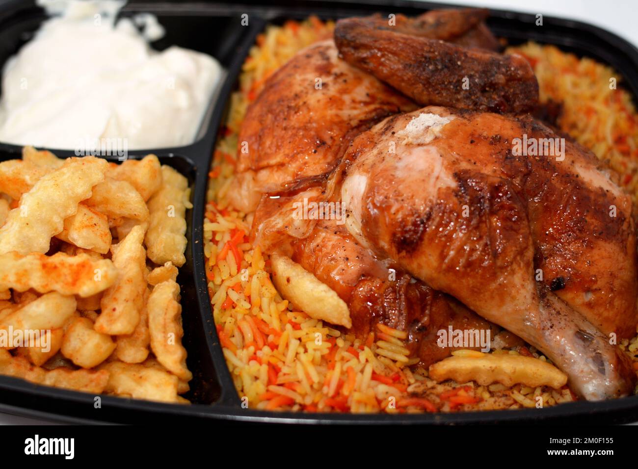 Arabic Syrian cuisine of machine grilled barbecued chicken with ...