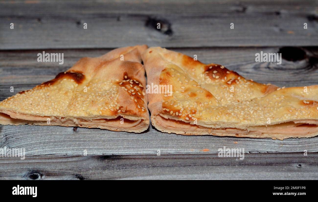 Traditional Arabic Syrian cuisine of a baked snack called Manakish a ...