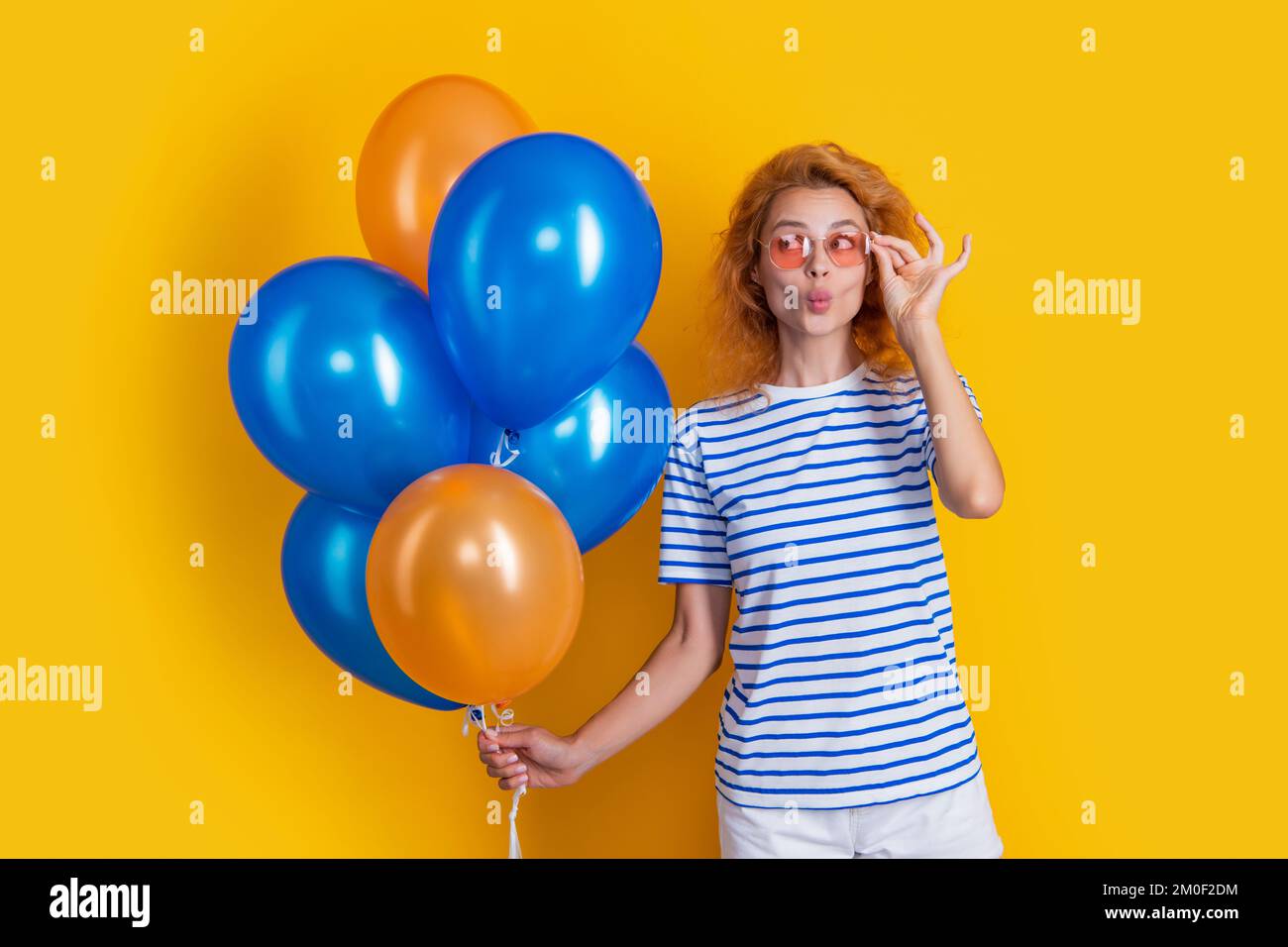 positive woman with birthday balloon in sunglasses. happy birthday ...