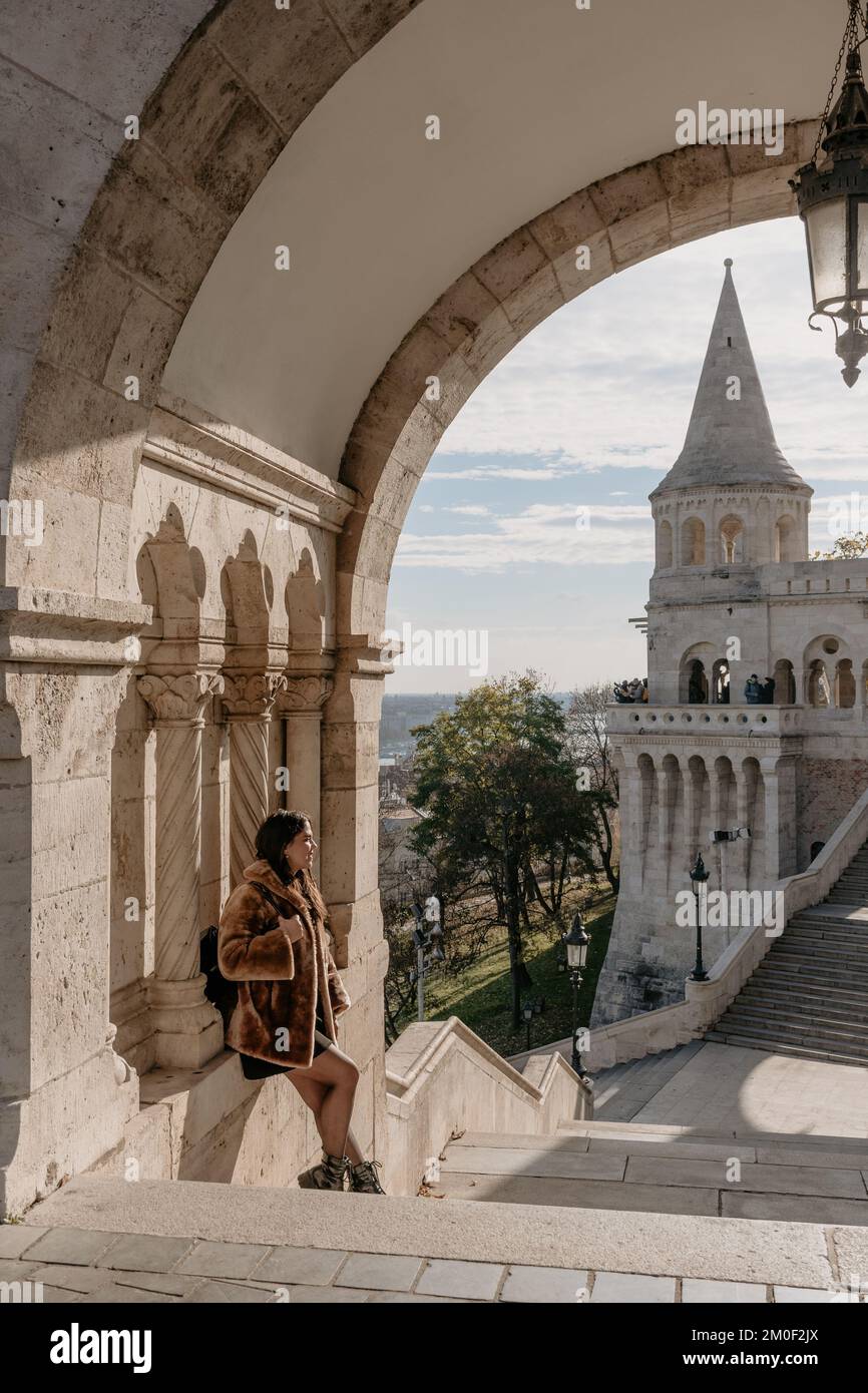 Girl standing on steps of famous landmark building fisherman's bastion ...