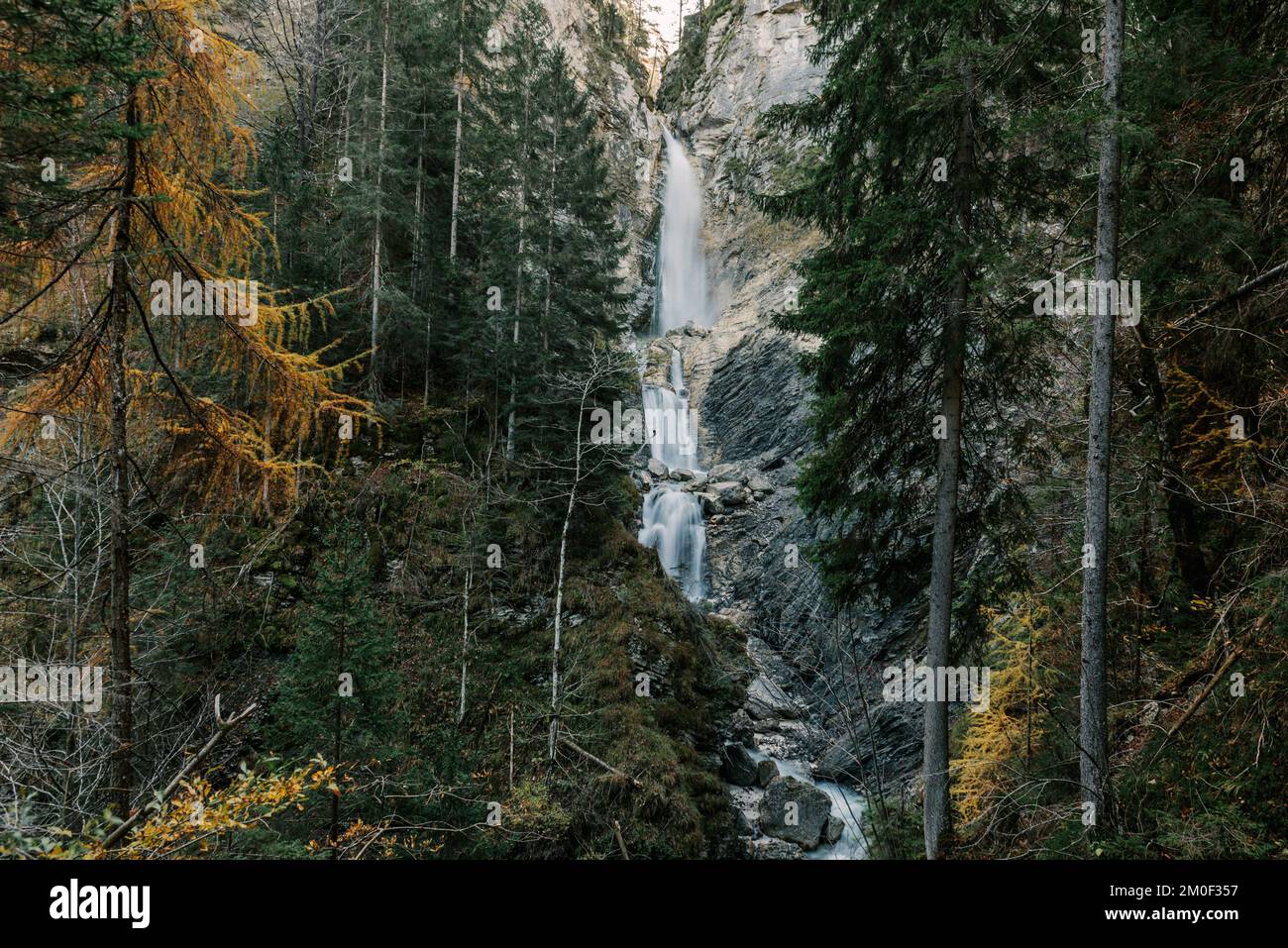Beautiful waterfall in moody forest in autumn in Gozd Martuljek in ...