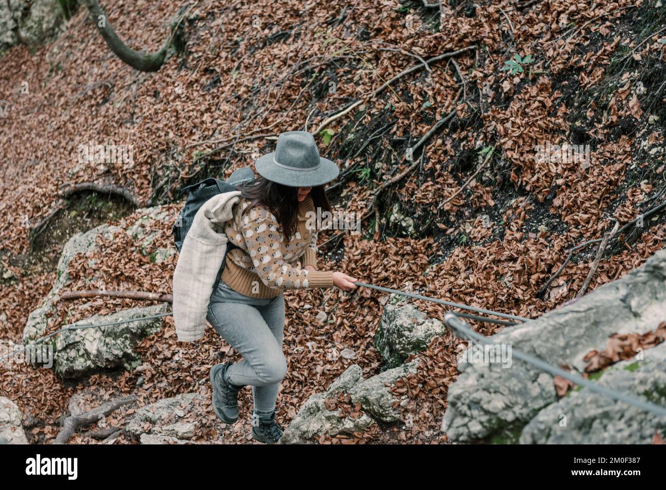 Girl walking over rocks hi-res stock photography and images - Alamy
