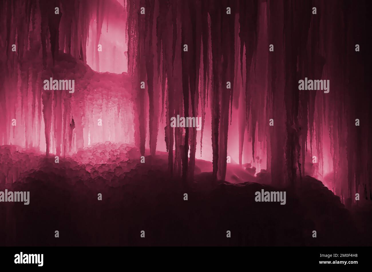 Huge ice icicles. Fragment of large blocks of ice frozen waterfall of ...