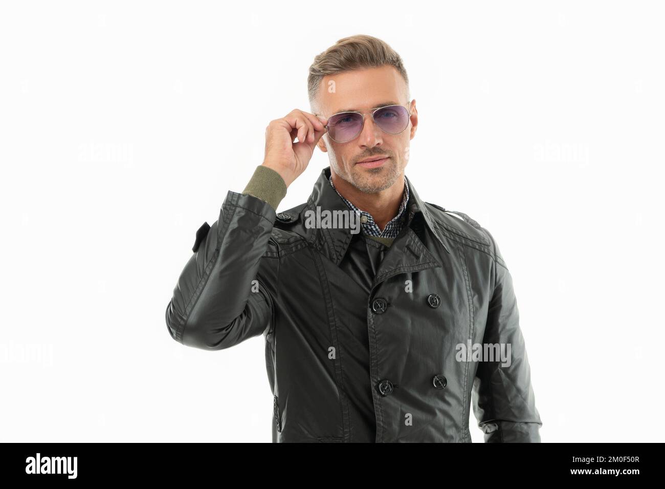 studio shot of handsome grizzled man. adult grizzled man in glasses ...