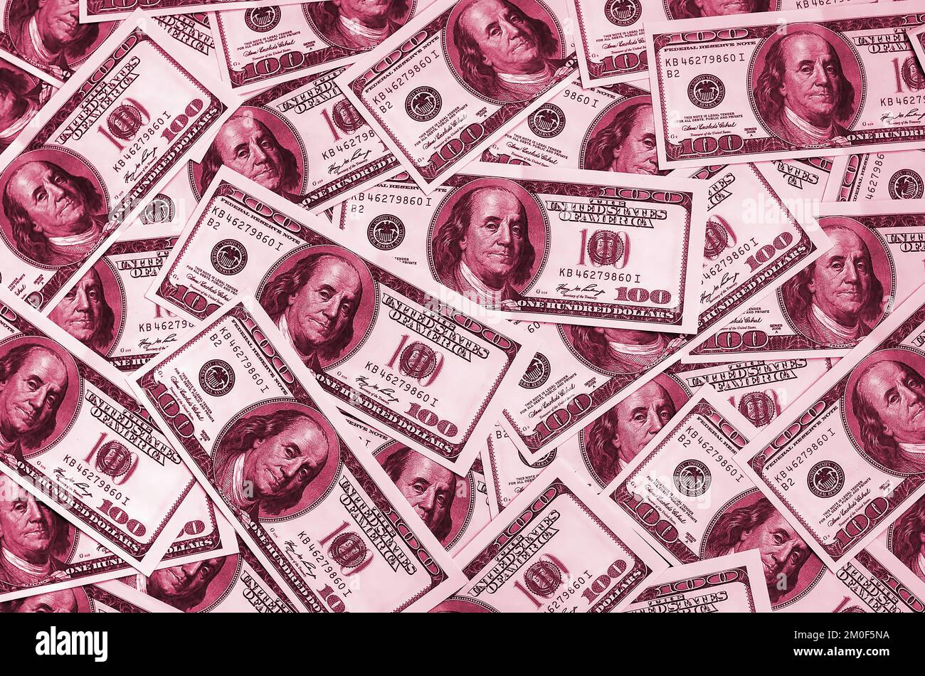 A pile of one hundred US banknotes with president portraits. Cash of ...