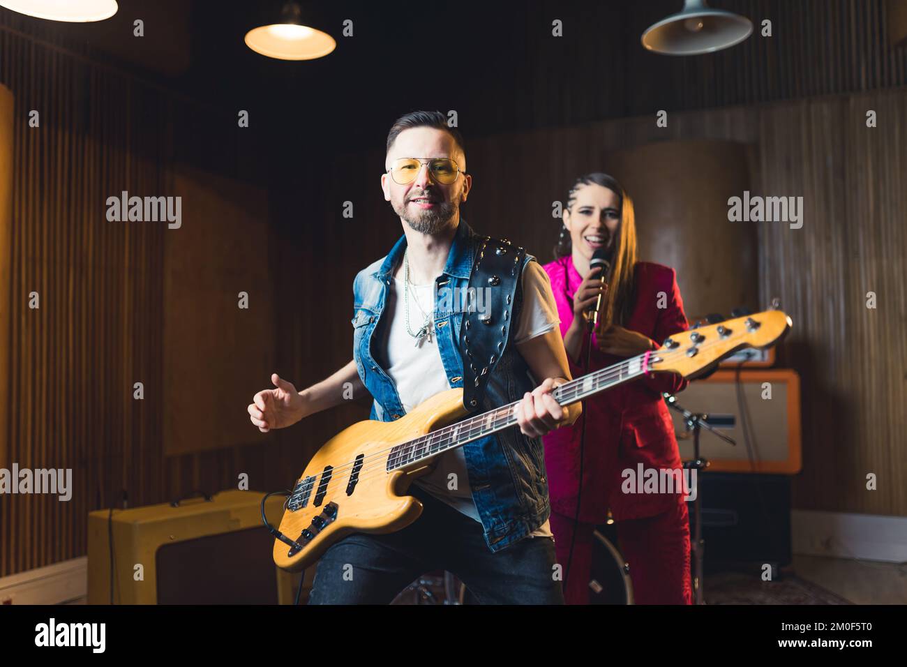 Music band having a rehearsal in a studio. High quality photo Stock ...