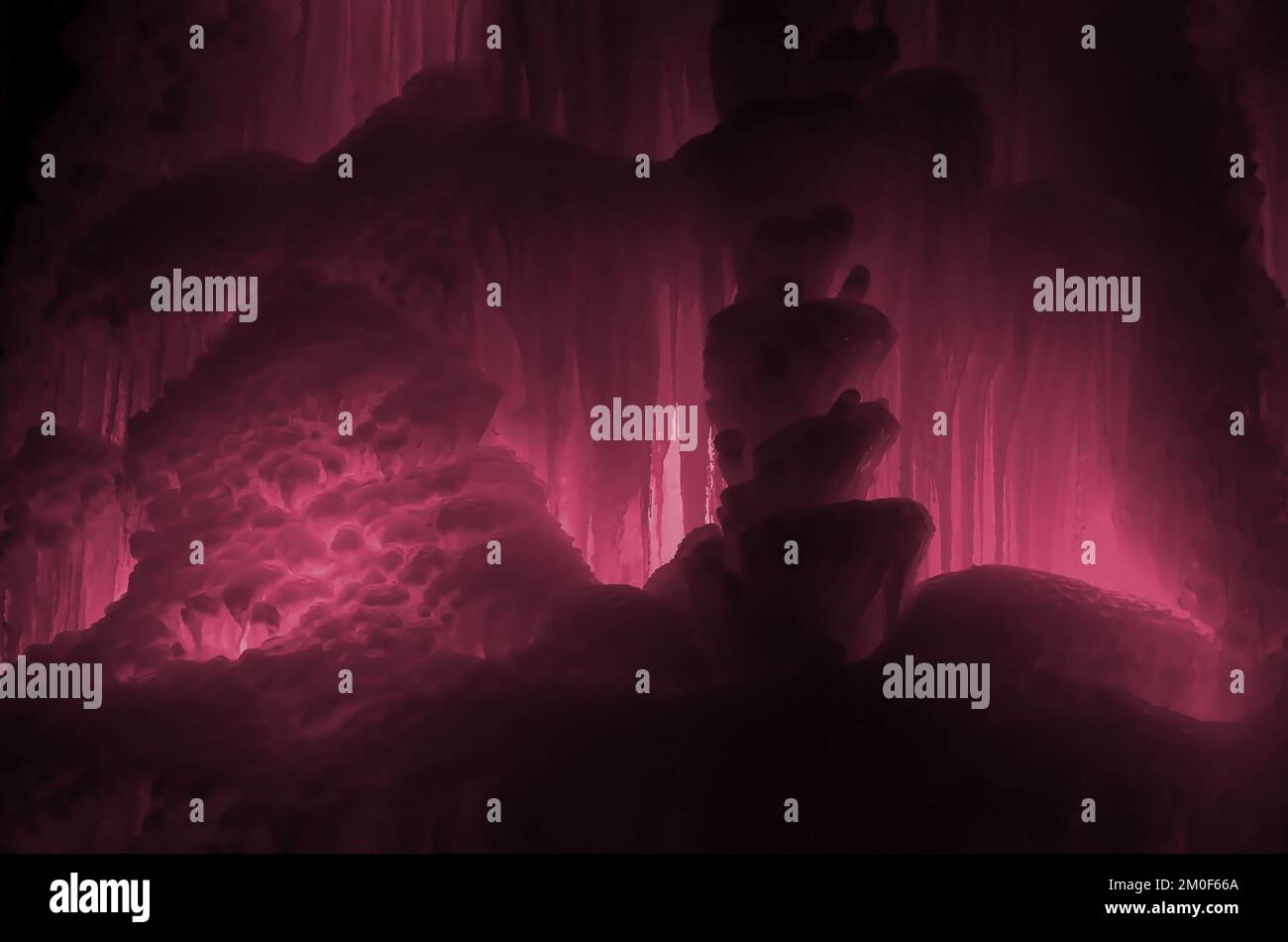 Huge ice icicles. Fragment of large blocks of ice frozen waterfall of ...