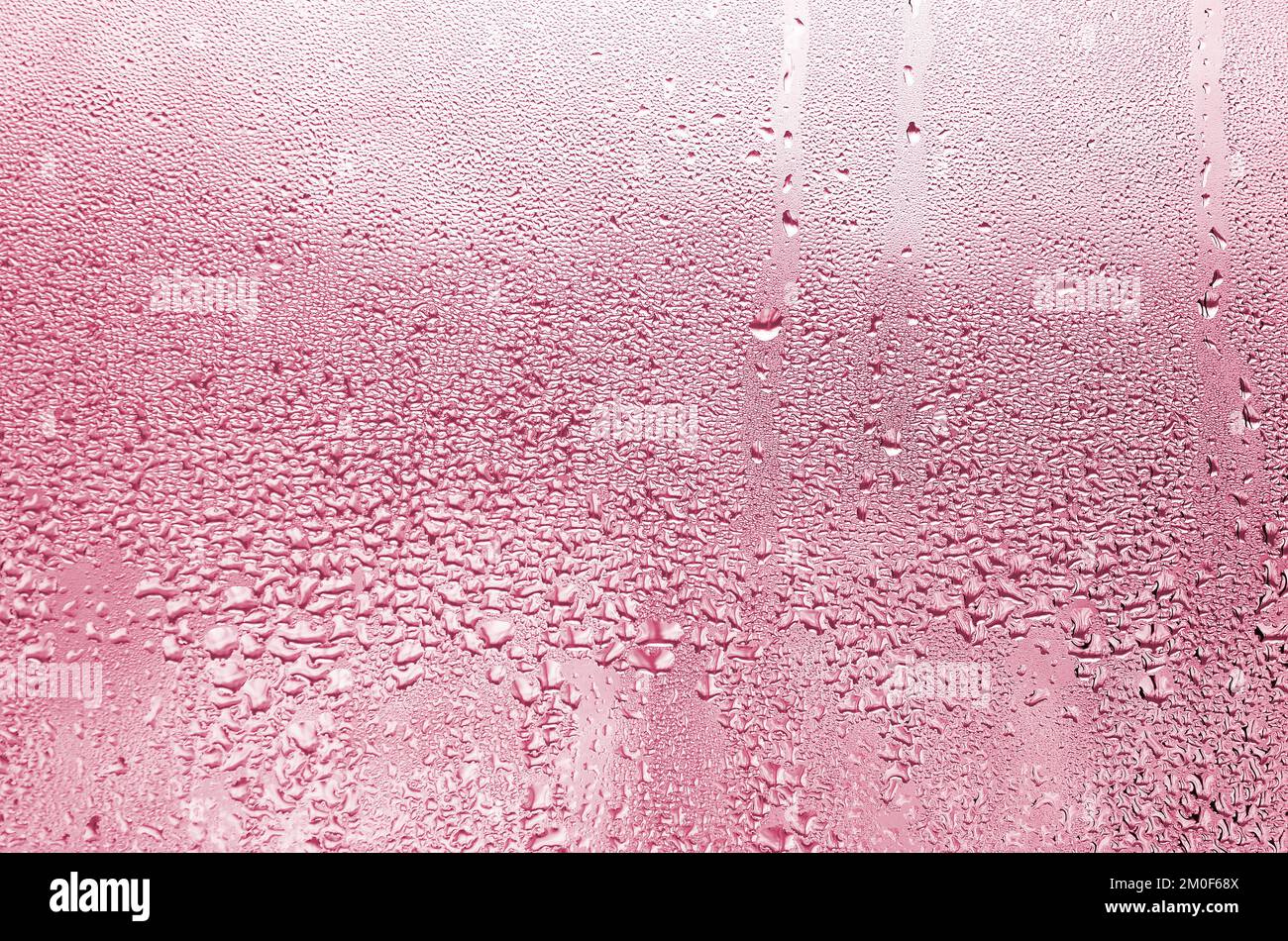 Texture of a drop of rain on a glass wet transparent background. Toned ...