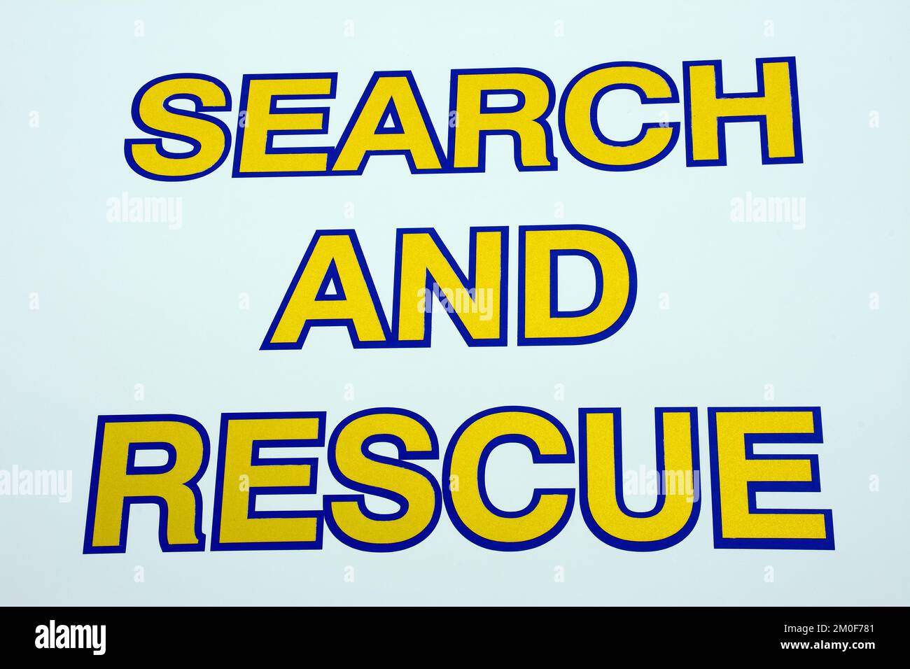 Blue and yellow Search and Rescue words against a white background ...