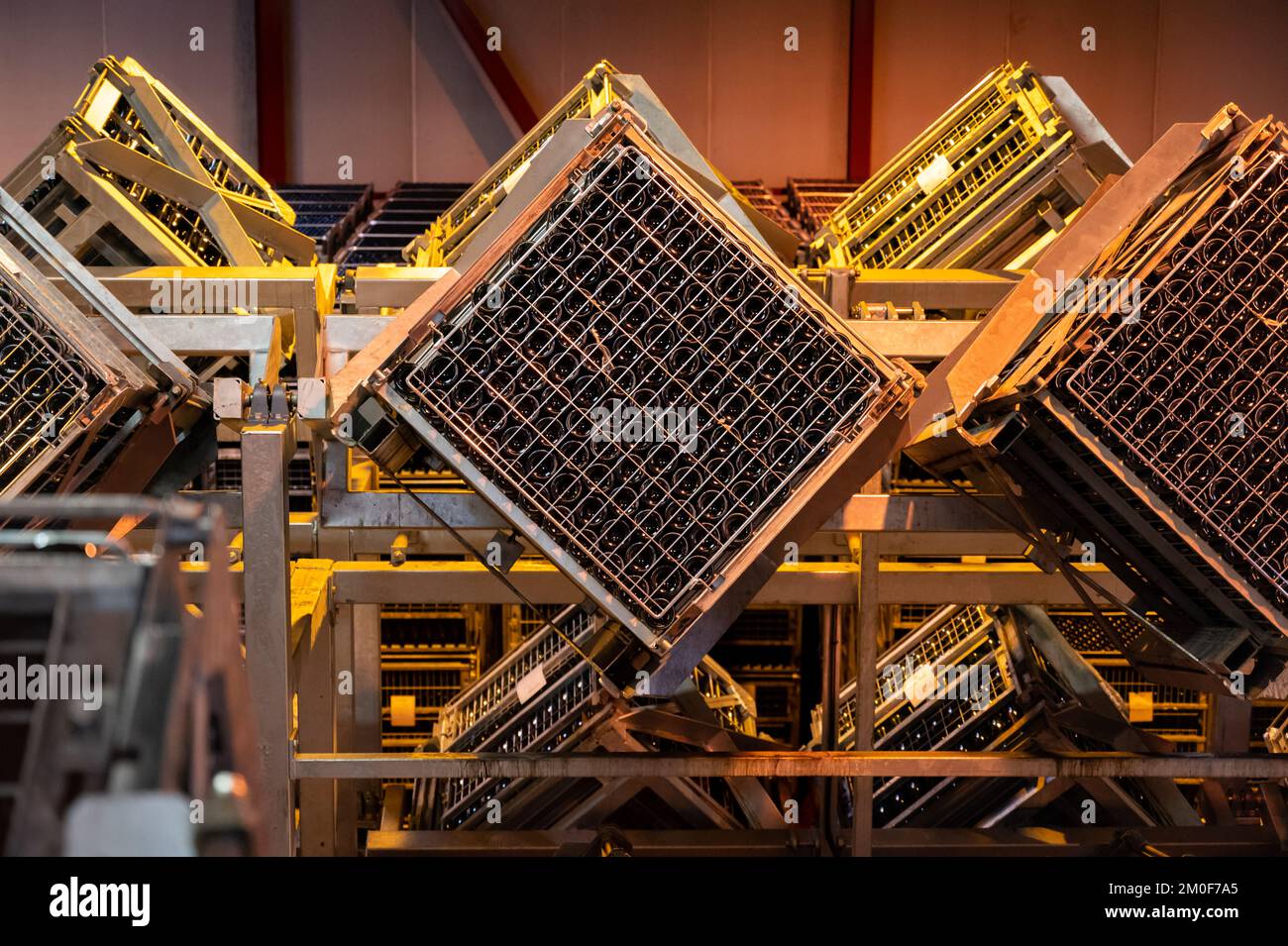 Production of cremant sparkling wine in Burgundy, France. Automatically ...