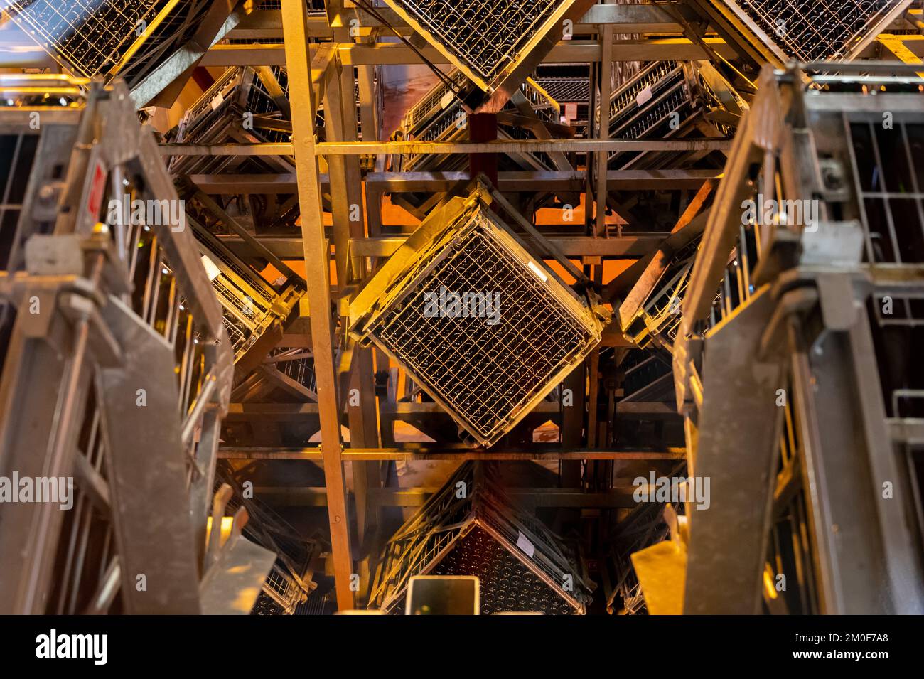 Production of cremant sparkling wine in Burgundy, France. Automatically ...