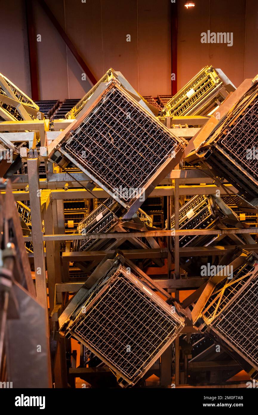 Production of cremant sparkling wine in Burgundy, France. Automatically ...