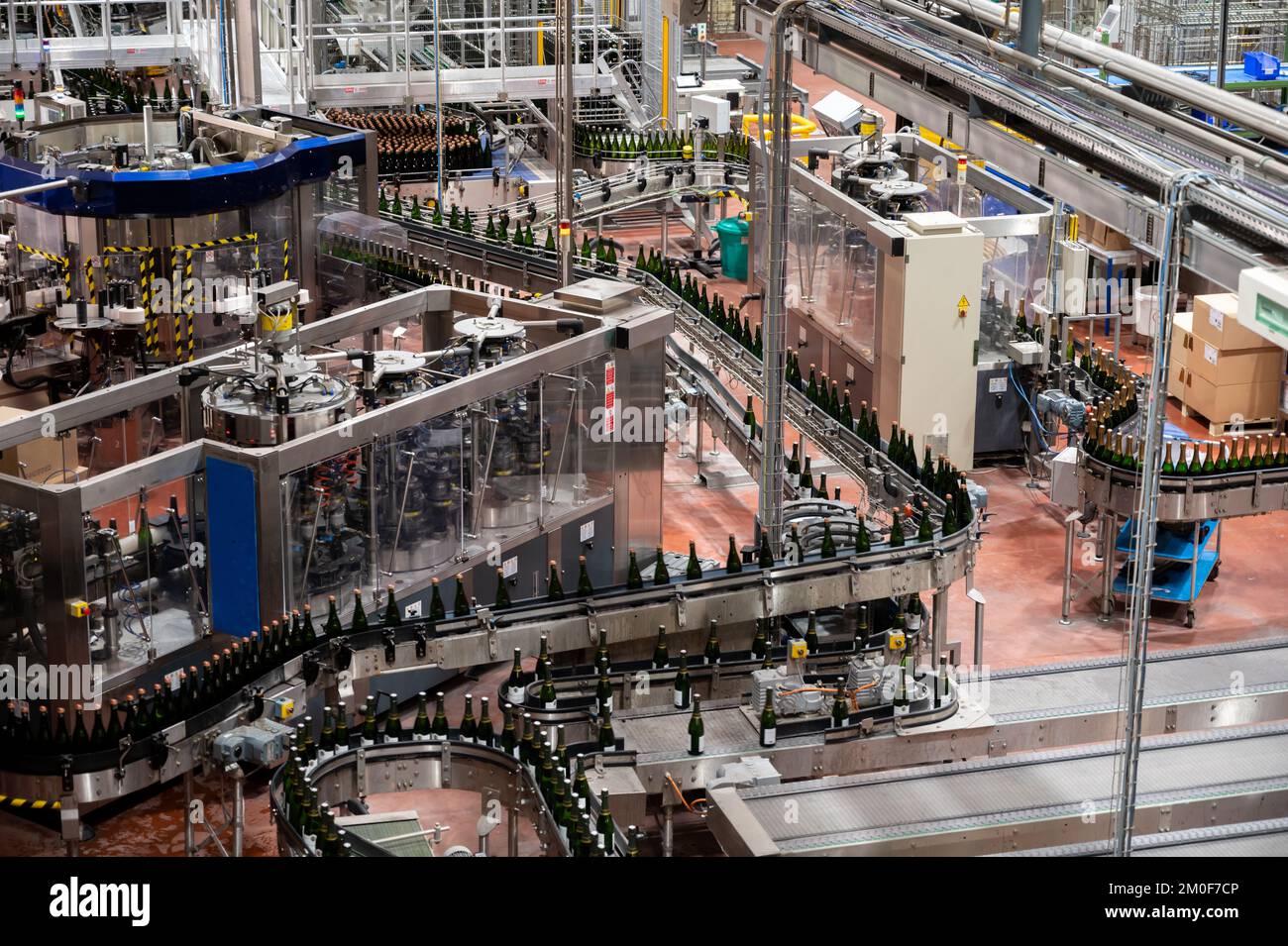 Production of cremant sparkling wine in Burgundy, France. Automatically ...